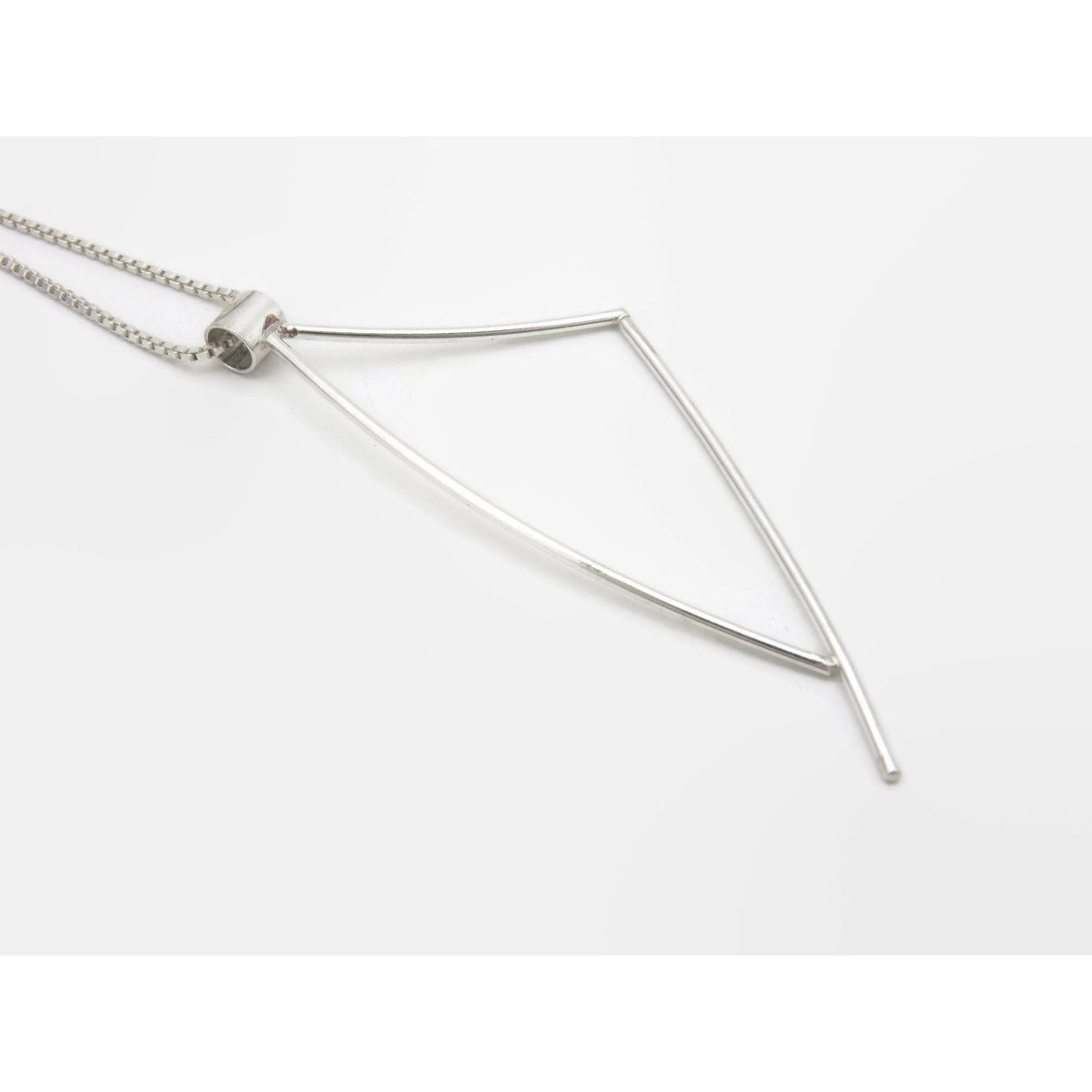 Negative Space Pendant – The Silversmith Jewelry